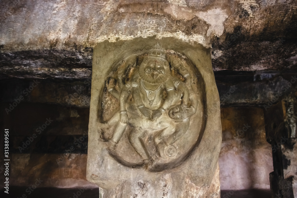 An ancient sculpture of the Hindu God Narasimha on a pillar inside the ...