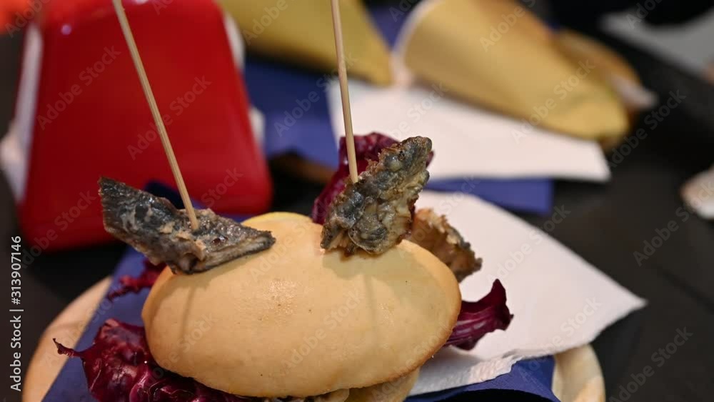 Close-up image with selective focus on an eel sandwich: specialty of ...
