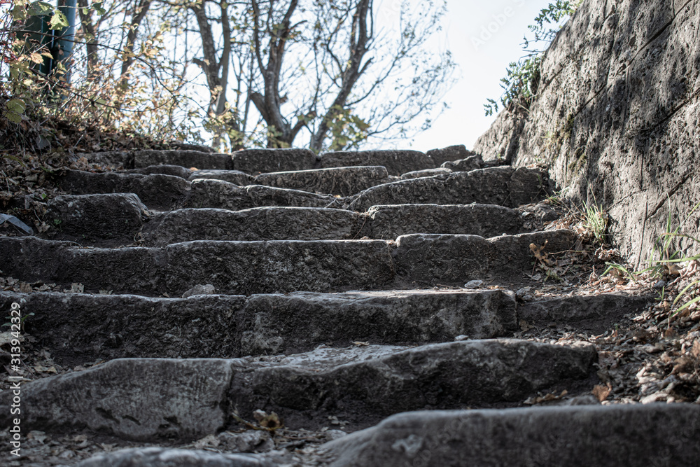 old stone stairs on a mountain road in Romania. closeup macro shoot ...