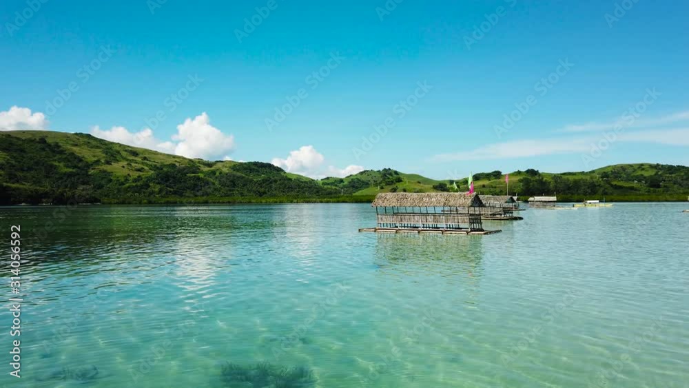 A floating native cottage on a Manlawi Sandbar, Caramoan, Philippines ...