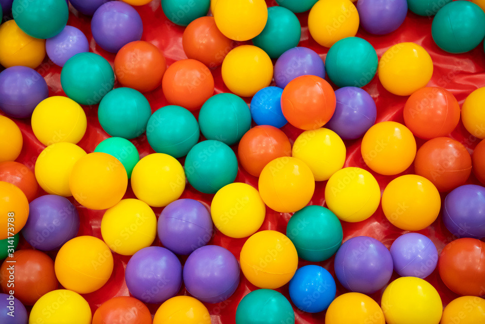 colorful plastic balls in playground yard. Stock Photo | Adobe Stock