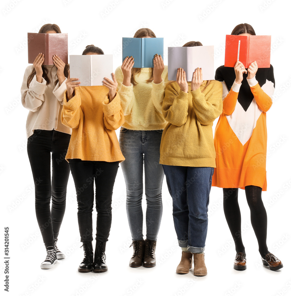 Young women with books on white background Stock Photo | Adobe Stock