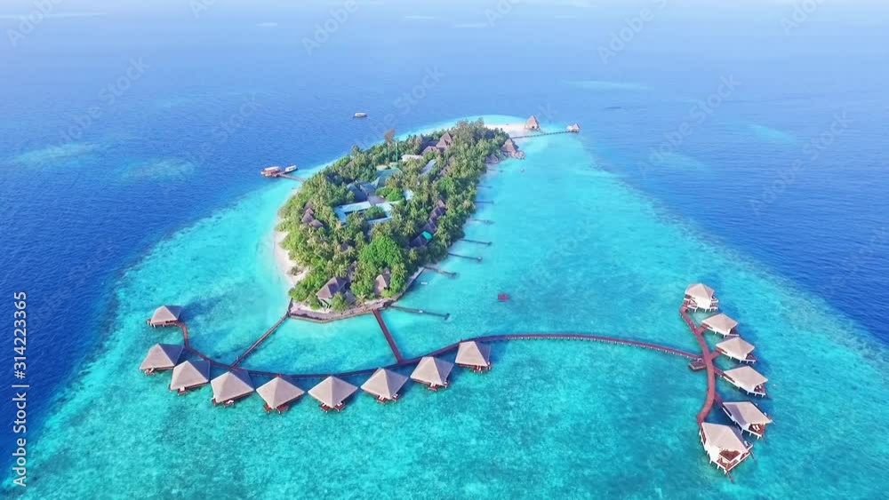 Aerial View of Luxurious Overwater Villas Resort in Maldives Islands B ...
