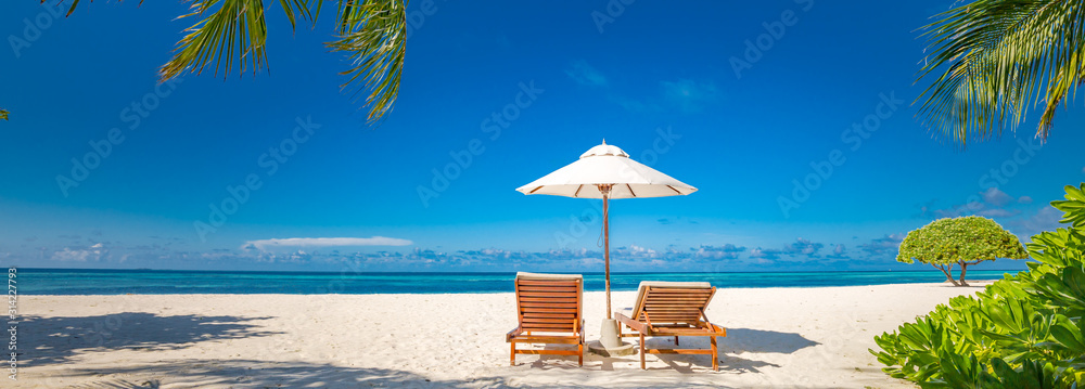 Luxury beach resort, beach loungers near the sea with white sand over ...