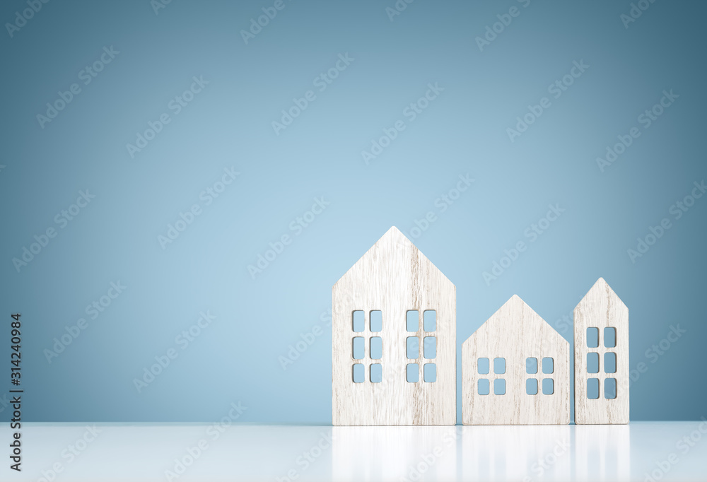 House real estate and construction background, wooden model houses ...