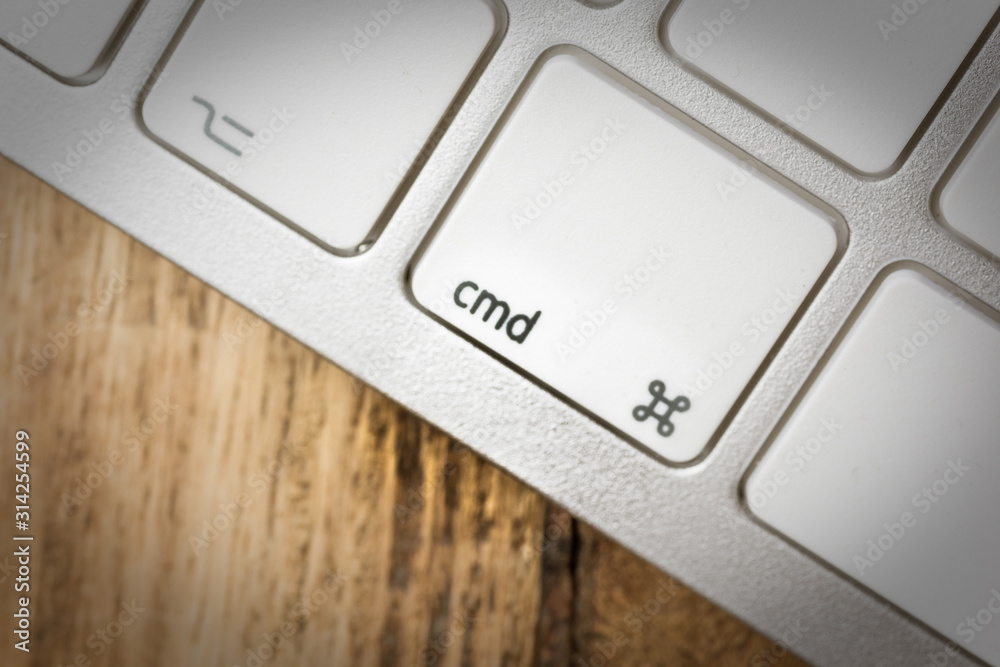 Computer keyboard - silver keyboard of a laptop with button CMD ...