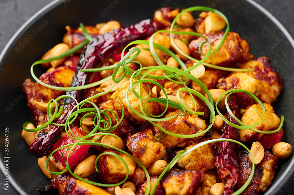 Kung Pao Paneer at black slate background. Kung Pao Paneer is a ...