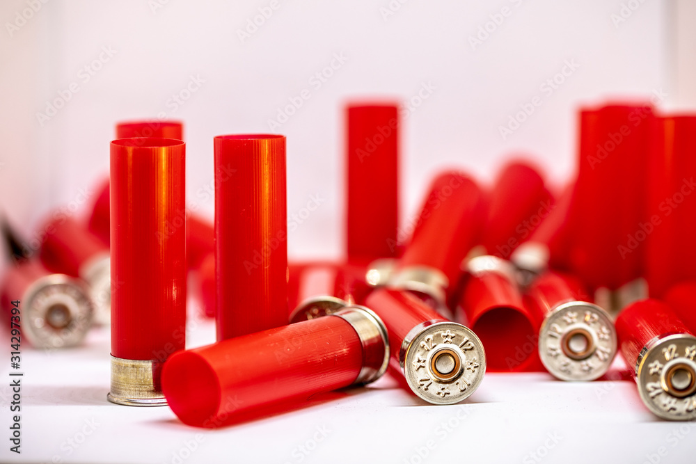Red shotgun shell on a white background. 12 gauge. concept of hunting ...