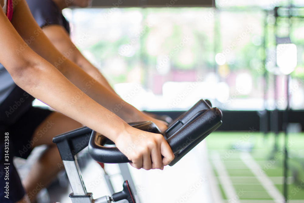 beauty asia woman and hansome man biking spinning cycing exercise ...