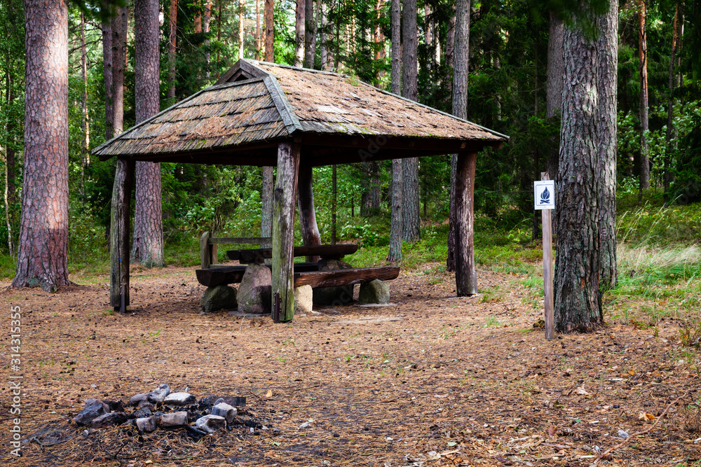 Place in forest where it is allowed to make open fire (bonfire sign ...
