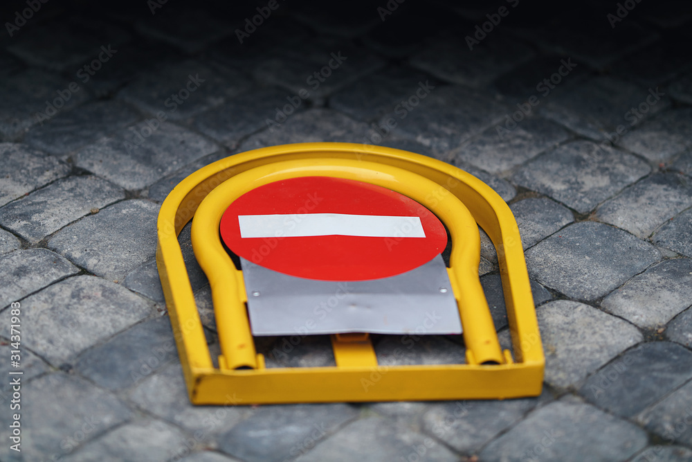 Manual car parking barrier with lock and stop sign. Car parking lock ...