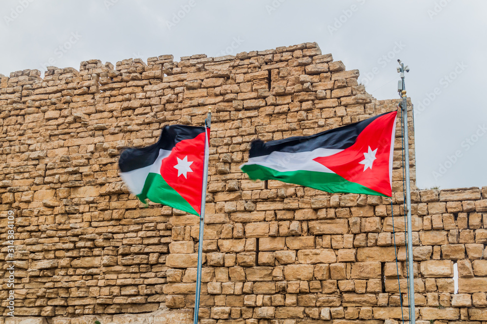 Flags of Jordan at the ruins of Karak castle, Jordan Stock Photo ...