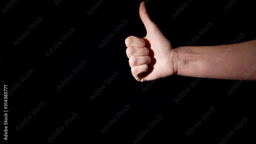 Vidéo Stock This video shows an anonymous hand giving the thumbs up ...