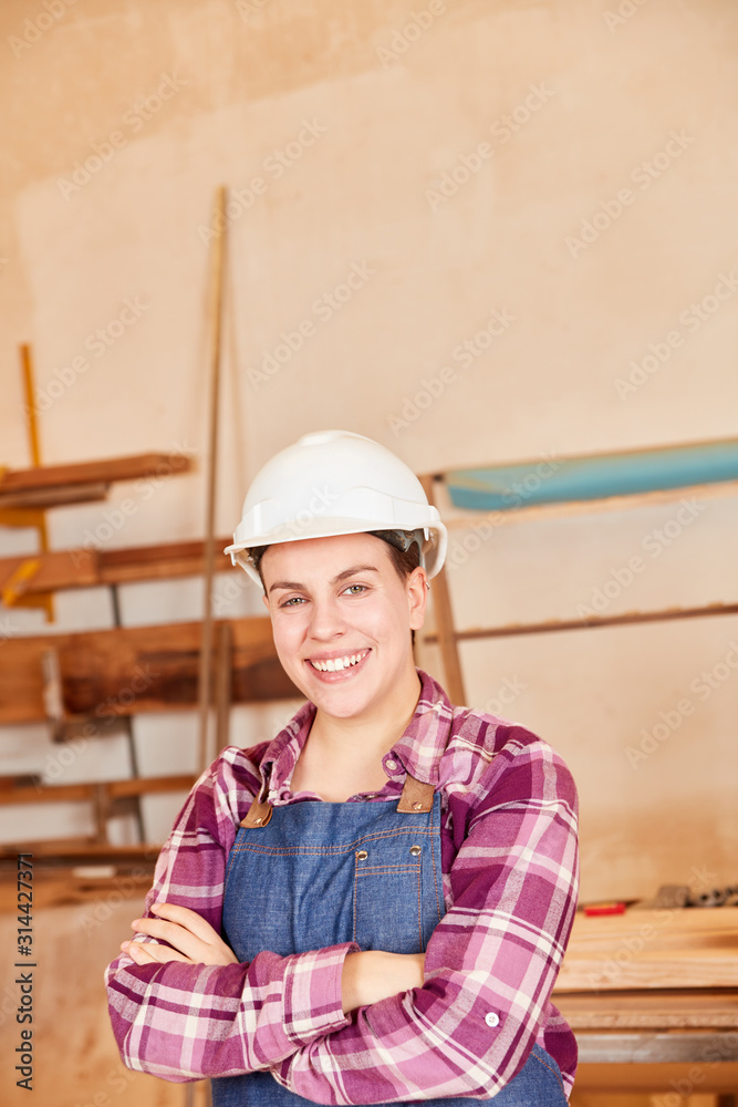 Junge Frau als Handwerker Lehrling Stock Photo | Adobe Stock
