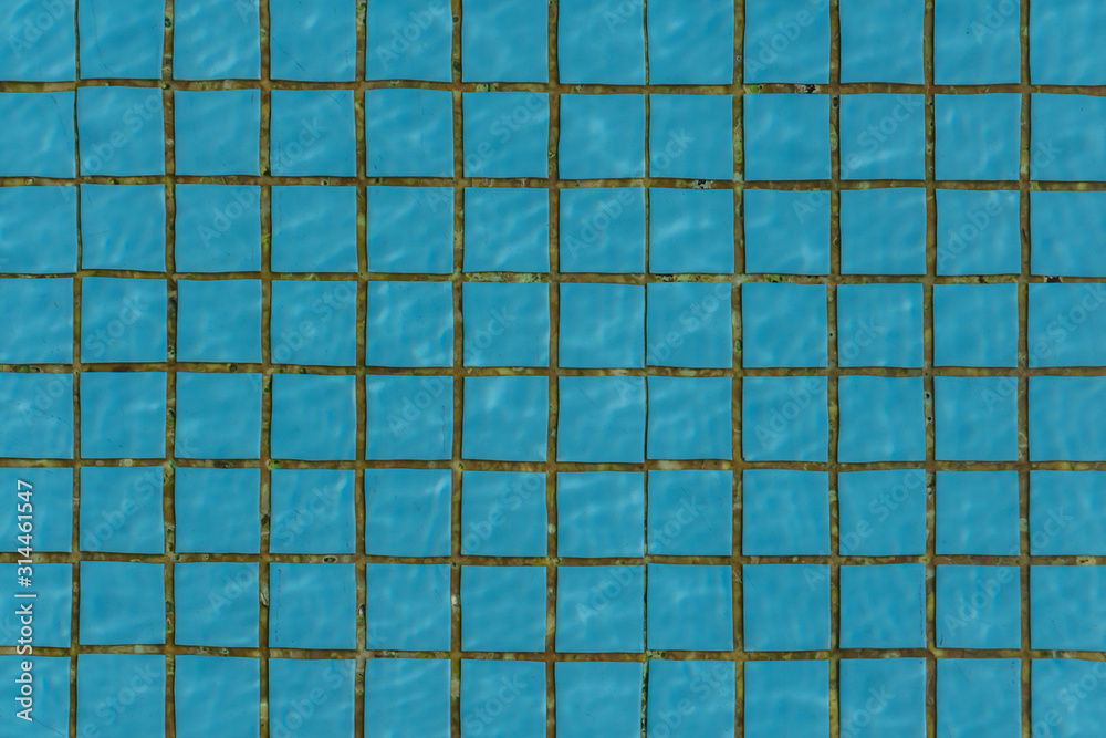 Beautiful texture of water with sun lights in a pool on the blue ...