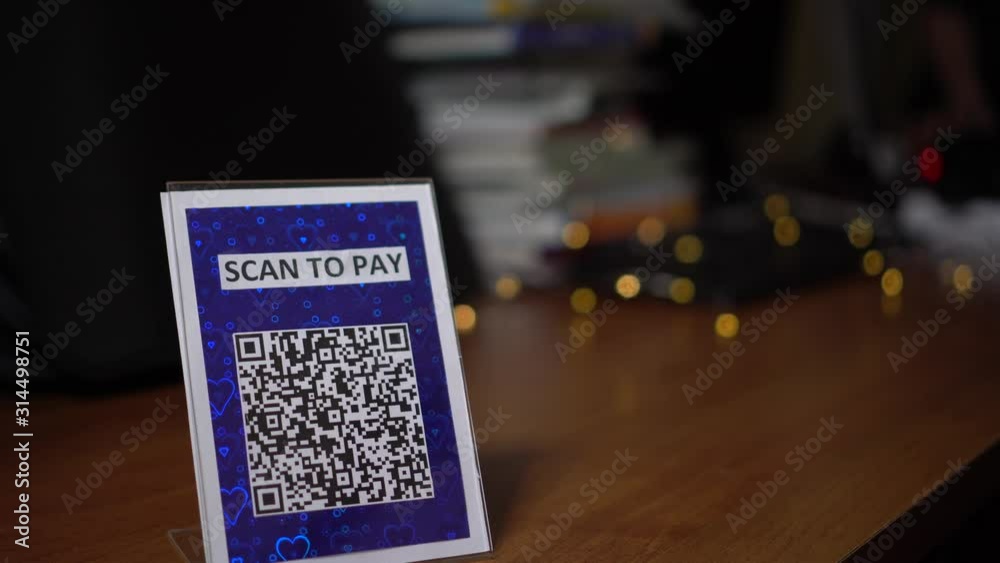QR code payment display in the retail store. To use a QR code payment ...