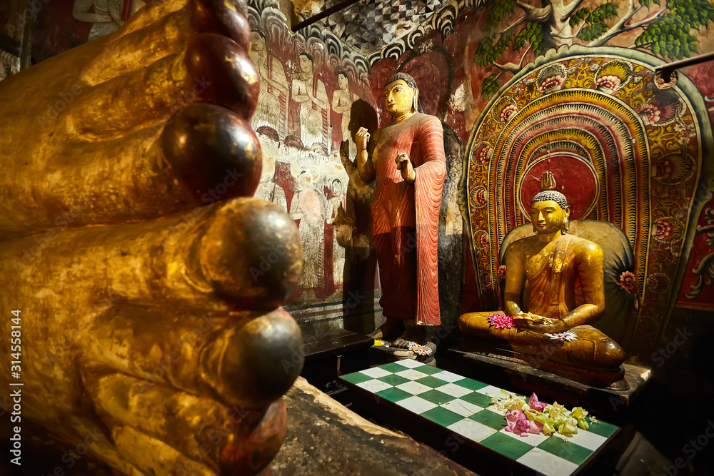 Sitting Buddha, statue in Dambulla cave temple. UNESCO Golden Temple of ...