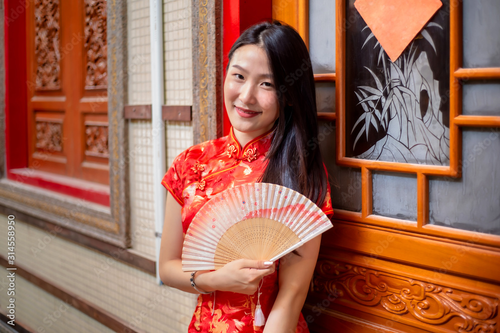Poster Beautiful young Chinese woman in a Cheongsam dresses or Chinese ...