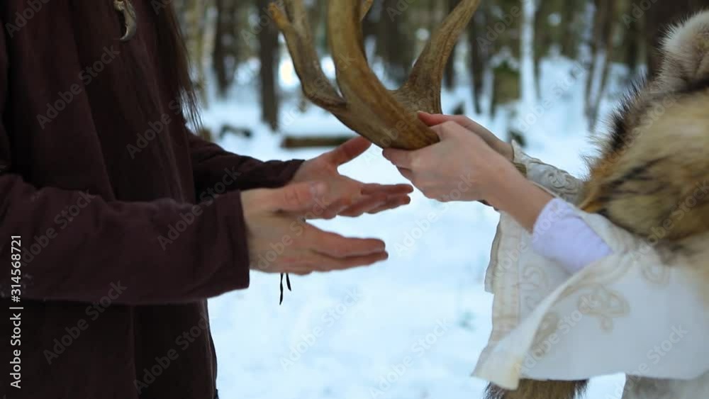Close up footage on hands of an elder priest and man. Spiritual guide ...