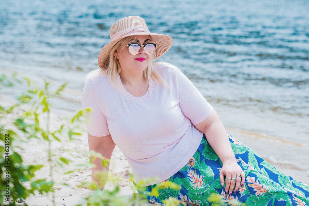 Young stylish woman walking on at nature. Casual fashion, romantic look ...