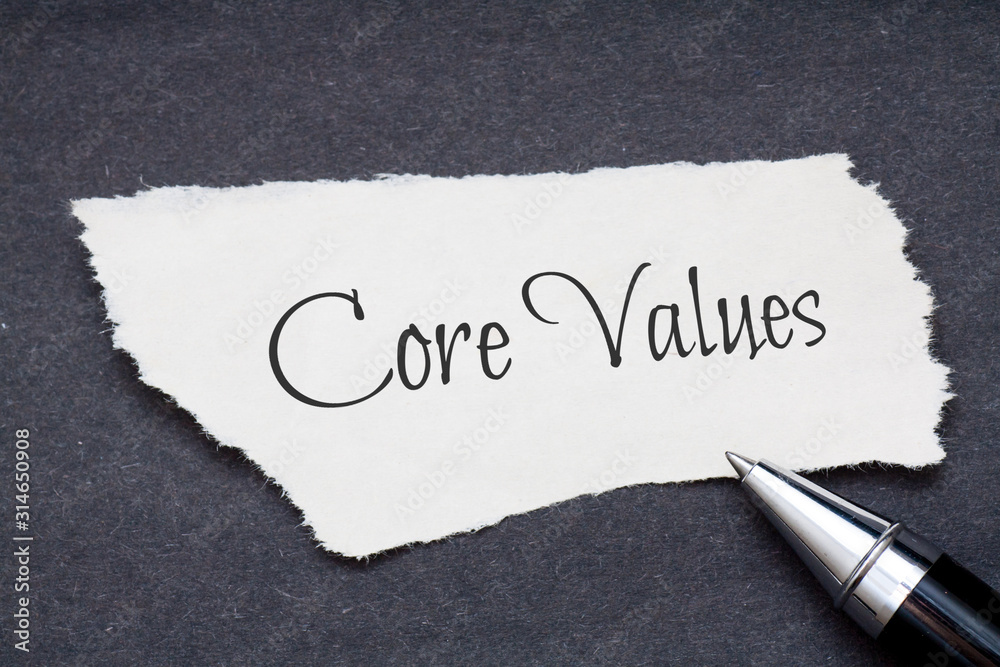 Core Values word,concept: Torn paper on black background with pen Stock ...