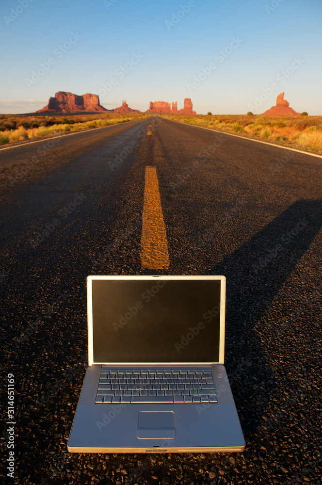 Foto de Golden sunset view of laptop computer with blank screen sitting ...