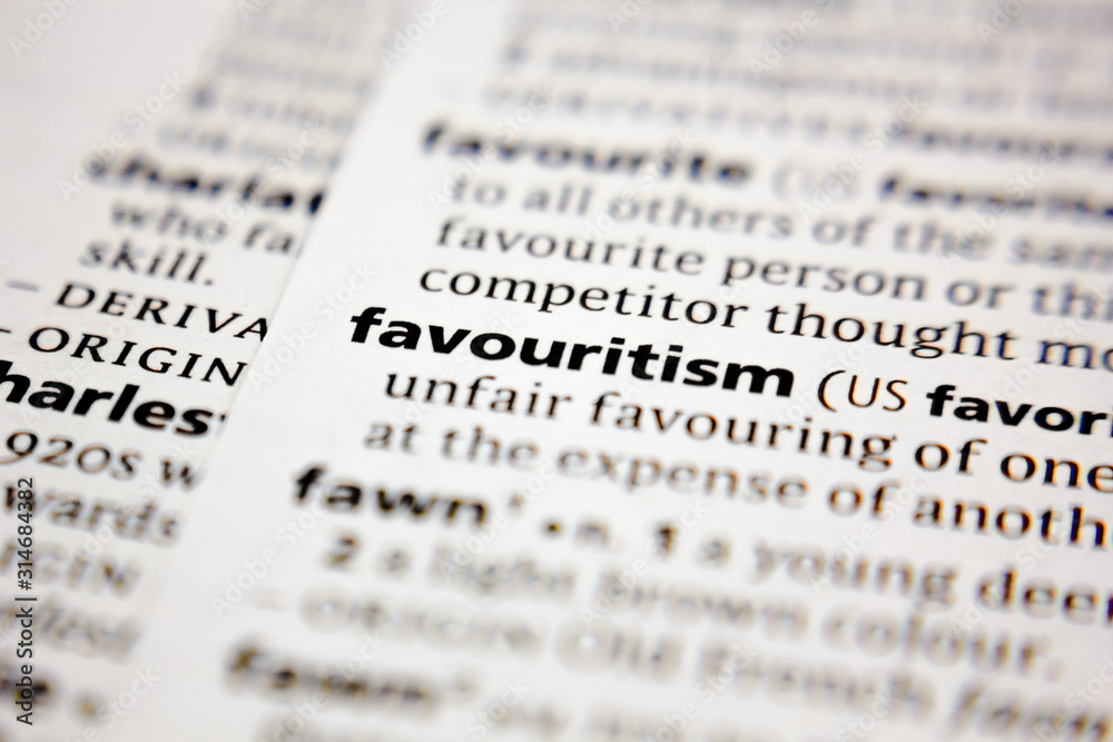 Word or phrase favouritism in a dictionary. Stock Photo | Adobe Stock