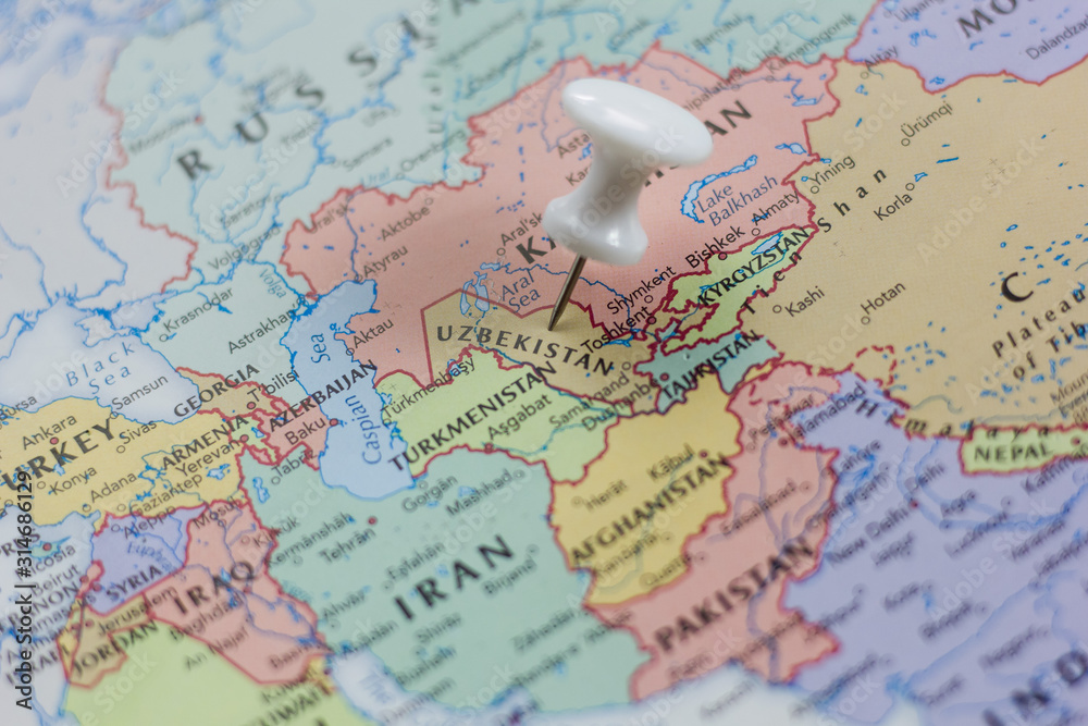 Uzbekistan on the map of the world. Stock Photo | Adobe Stock