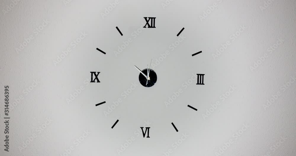 Clock on white background and movement of clock hands. Time lapse clock ...