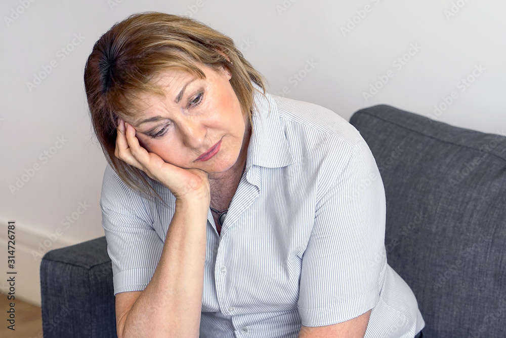 Sad senior woman. Mature woman sad middle aged worried concerned about ...