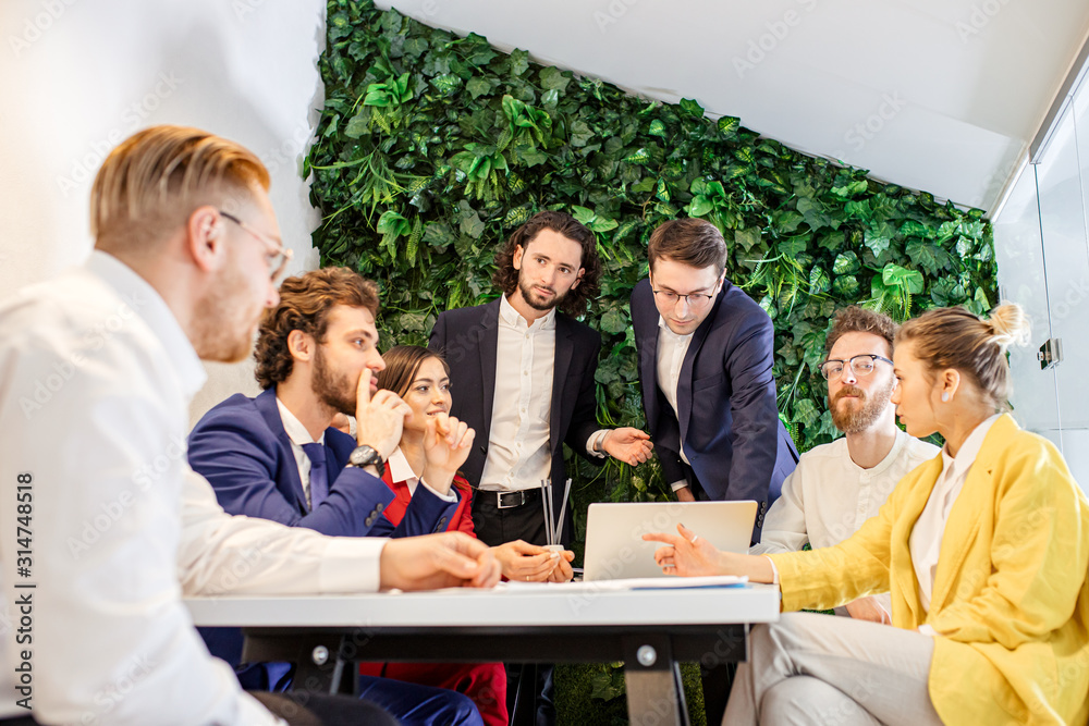 brainstorm, active discussion of business people in modern office with ...