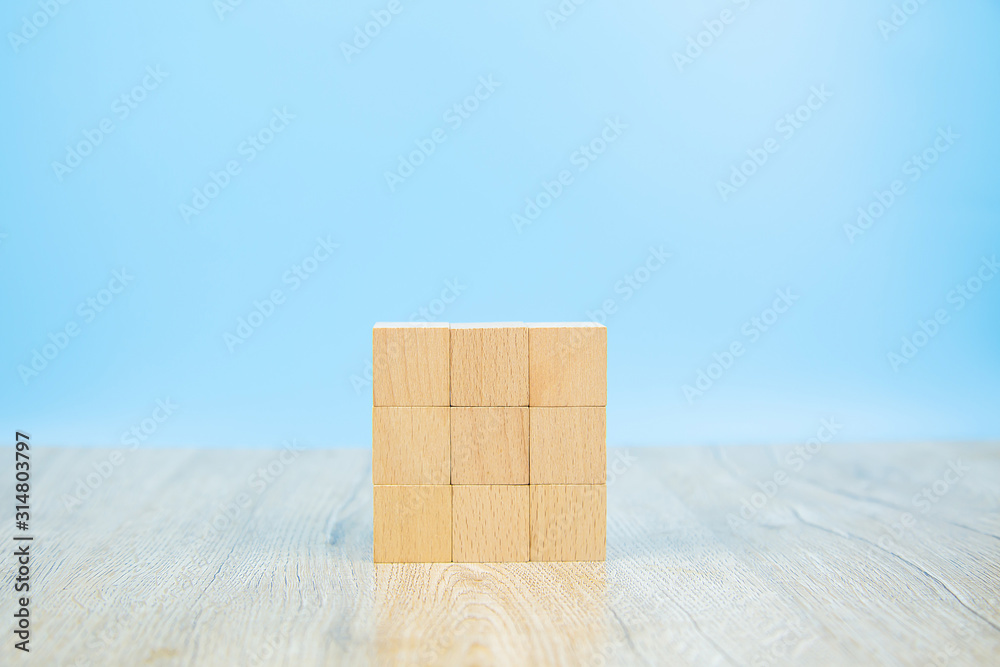Wooden block toy stacked in square shape without graphics for Business ...