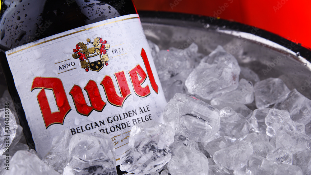 Bottle of Duvel beer in bucket with crushed ice Stock Photo | Adobe Stock