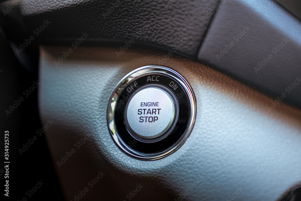 Start stop engine modern new technology car button, close up. Stock ...