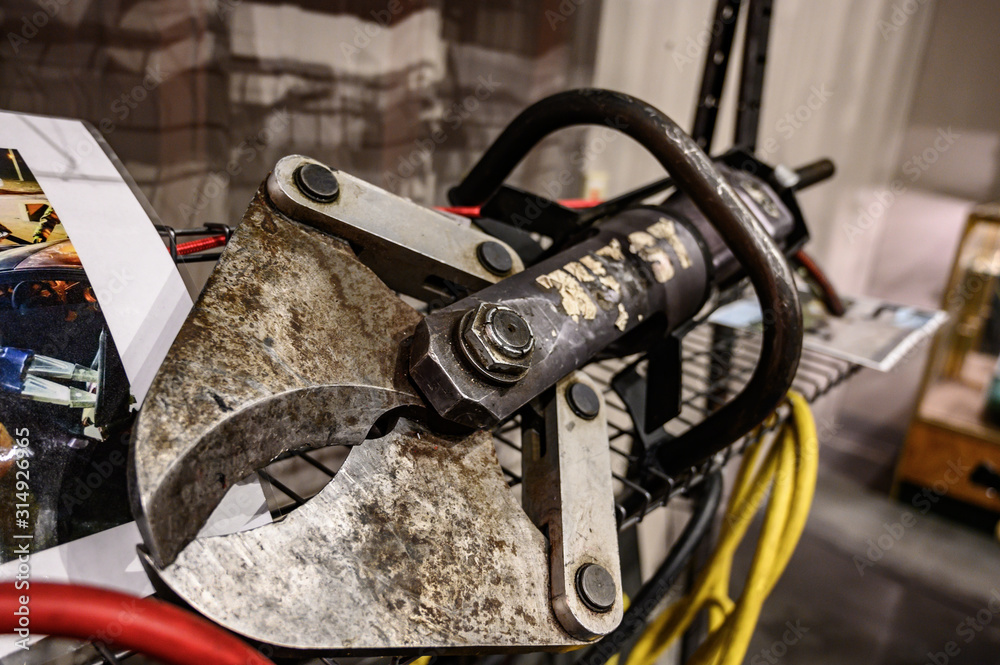 Closed jaws of a mechanical hydraulic rescue tool used by firefighters ...