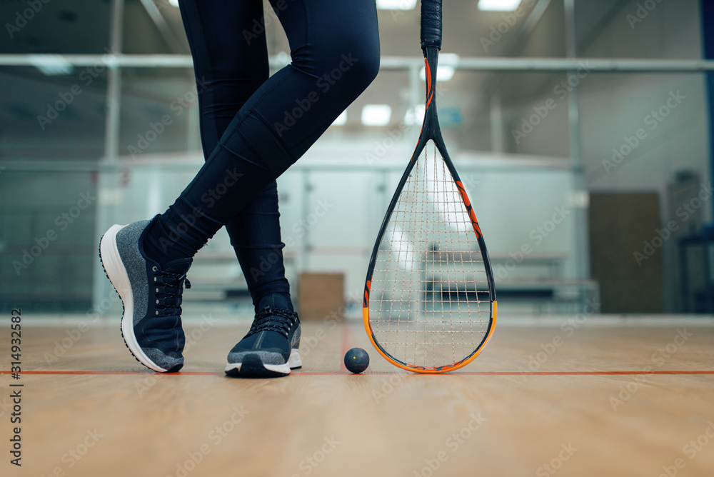Female player legs, squash racket and ball Stock Photo | Adobe Stock