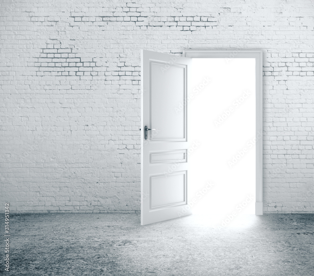 Open door in white brick wall. Stock Photo | Adobe Stock
