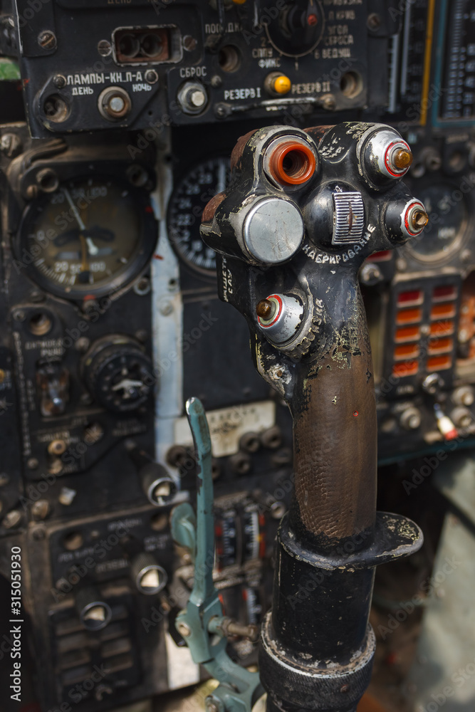 Military aircraft control knob. In the cockpit of an old, Soviet ...