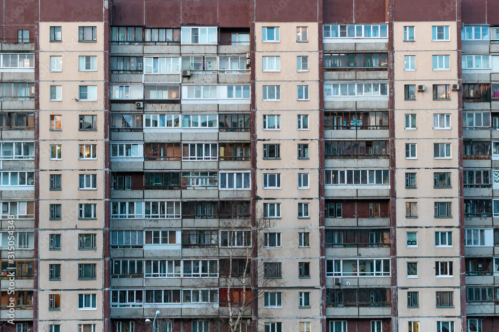 facade of an old panel residential building. typical residential ...