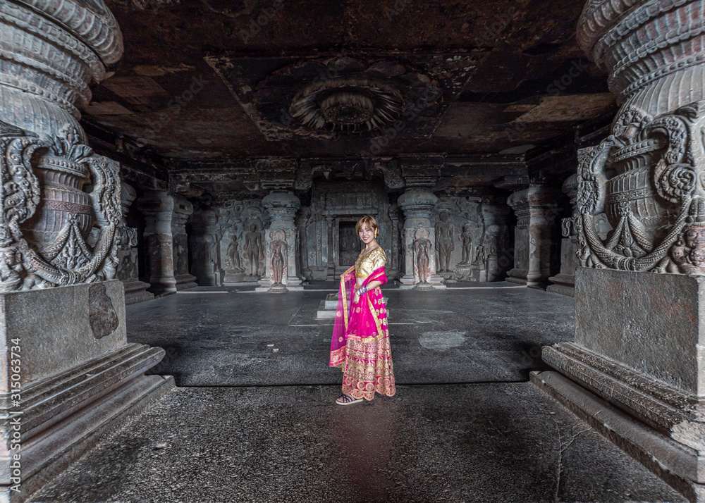 Photo & Art Print A Lady touring the Ellora Cave Ruins in India, mozailla69