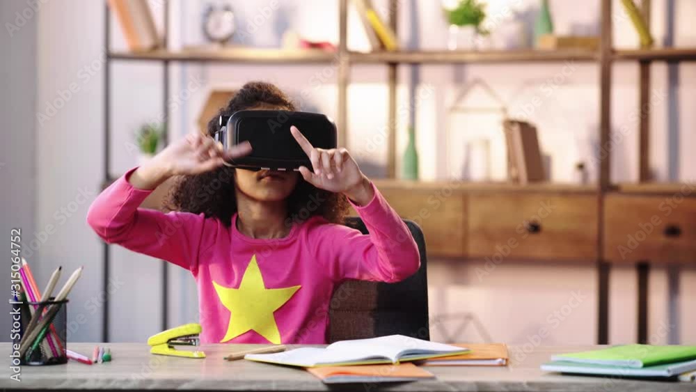 african american child gesturing in vr headset Stock Video | Adobe Stock