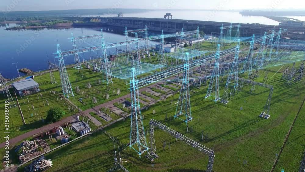 An aerial view a hydroelectric power station with infographic power ...