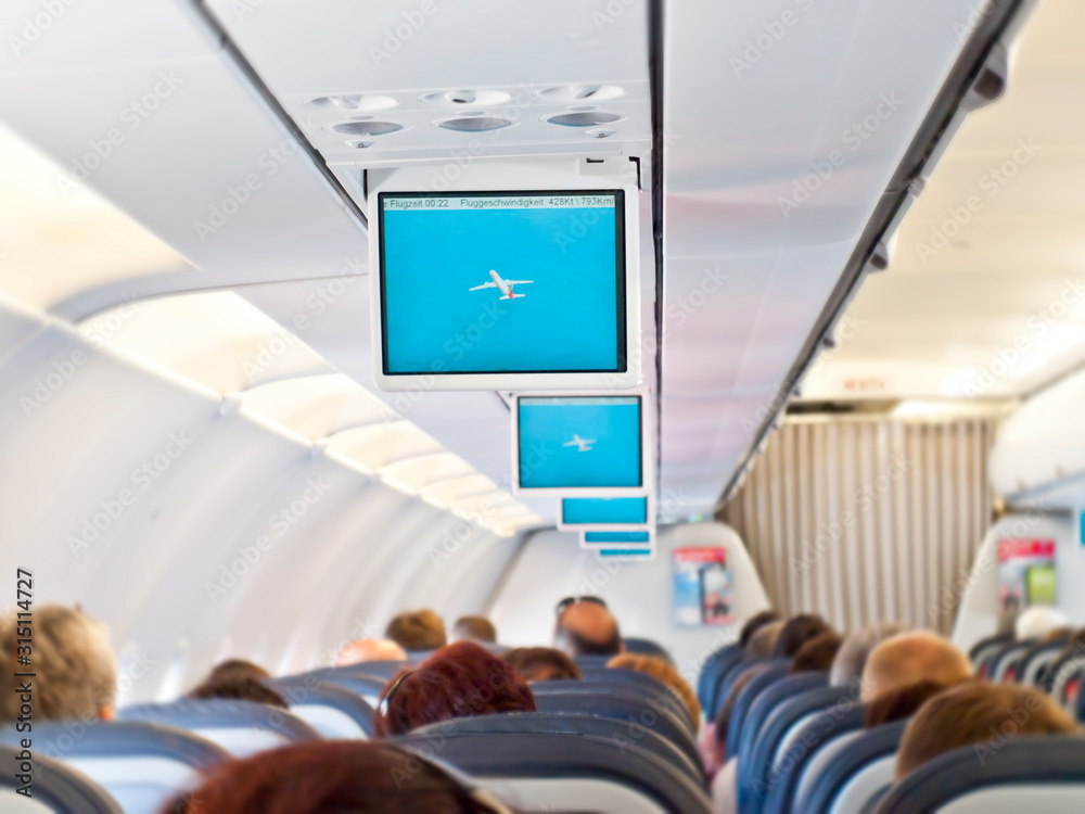 Display blue screen on the plane above the passenger seat, shows ...