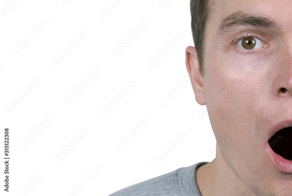 Half a man's face with his eyes and mouth open on a white background ...