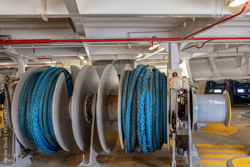 Babina with a sea mooring rope on board a cruise ship. Machinery On ...