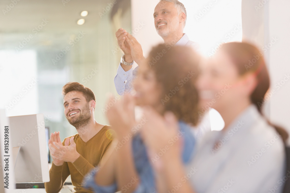 Business people clapping in office Stock Photo | Adobe Stock