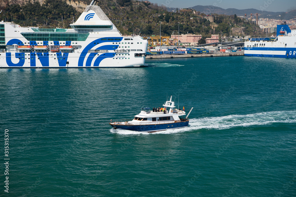 Big and small ships enter port Stock Photo | Adobe Stock