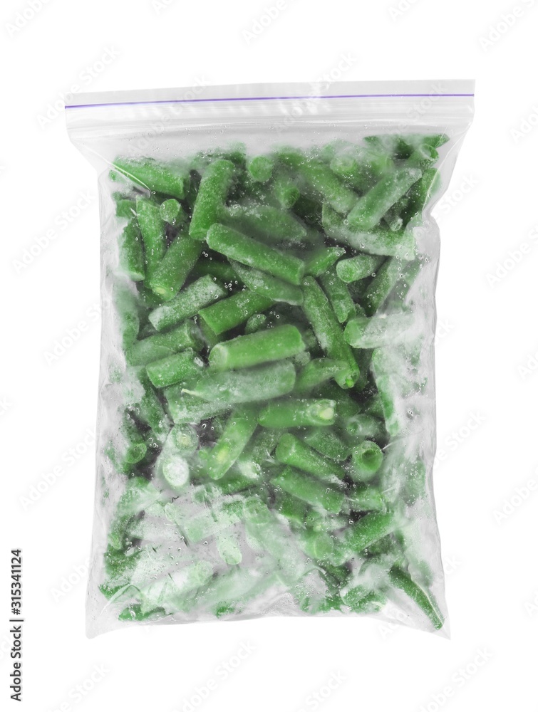 Frozen green beans in plastic bag isolated on white, top view ...