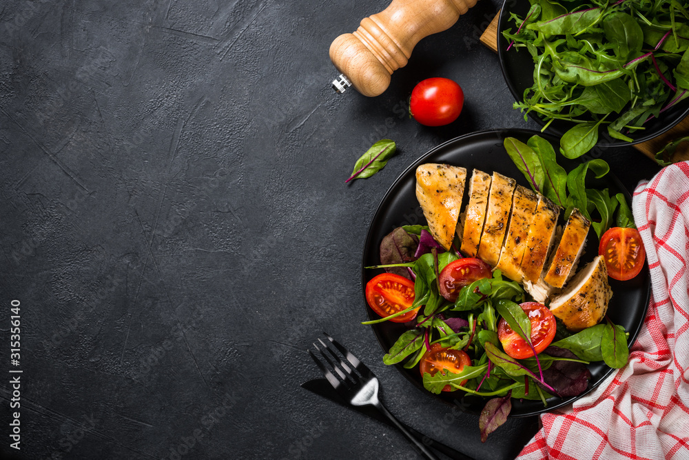 Chicken fillet with salad top view. Stock Photo | Adobe Stock