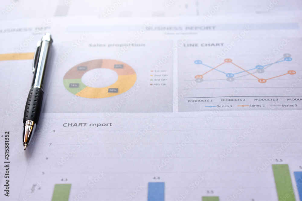 Documents about business charts and graph analysis with pan, placed on ...
